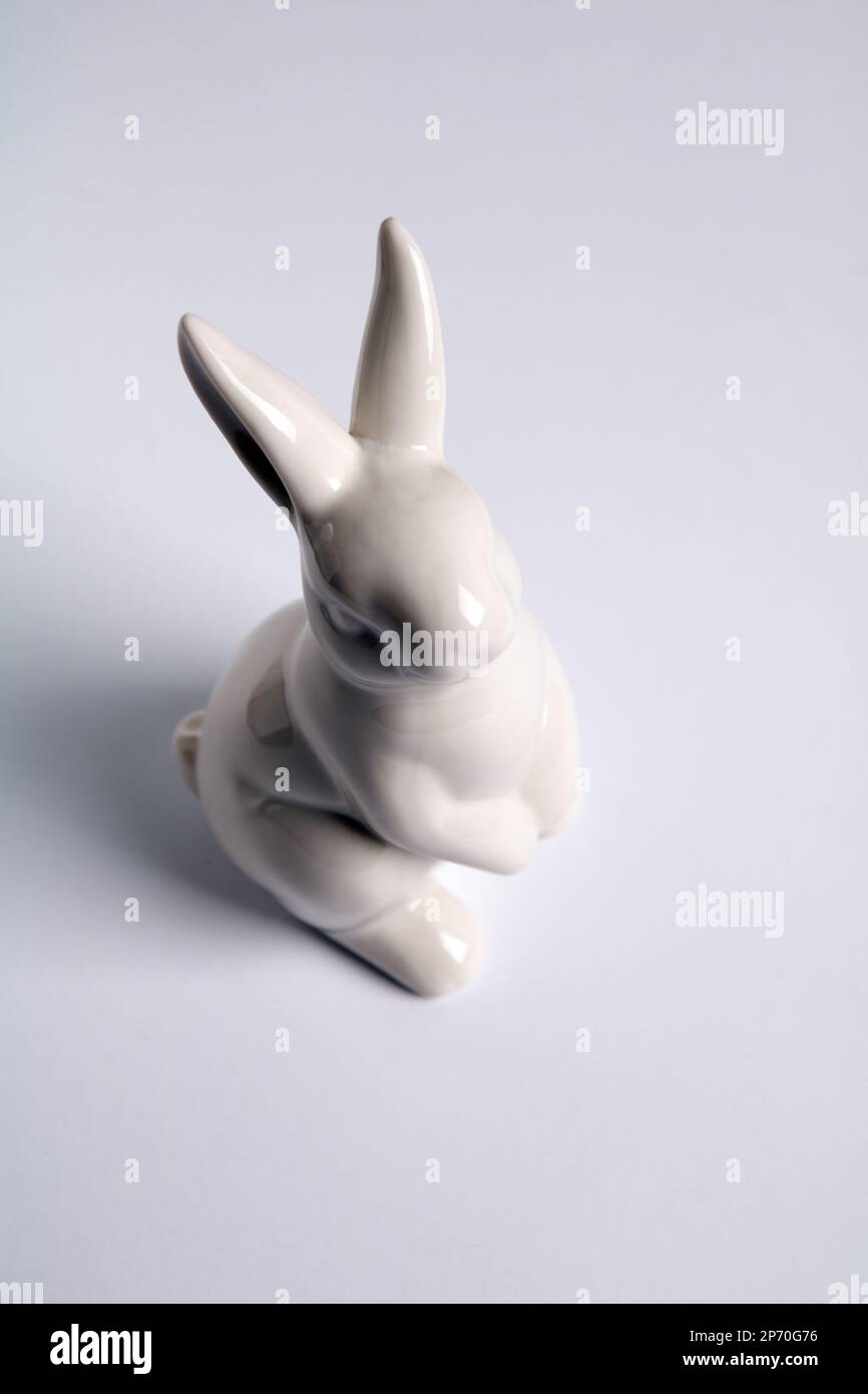 photo decorative white rabbit on a white background Stock Photo - Alamy