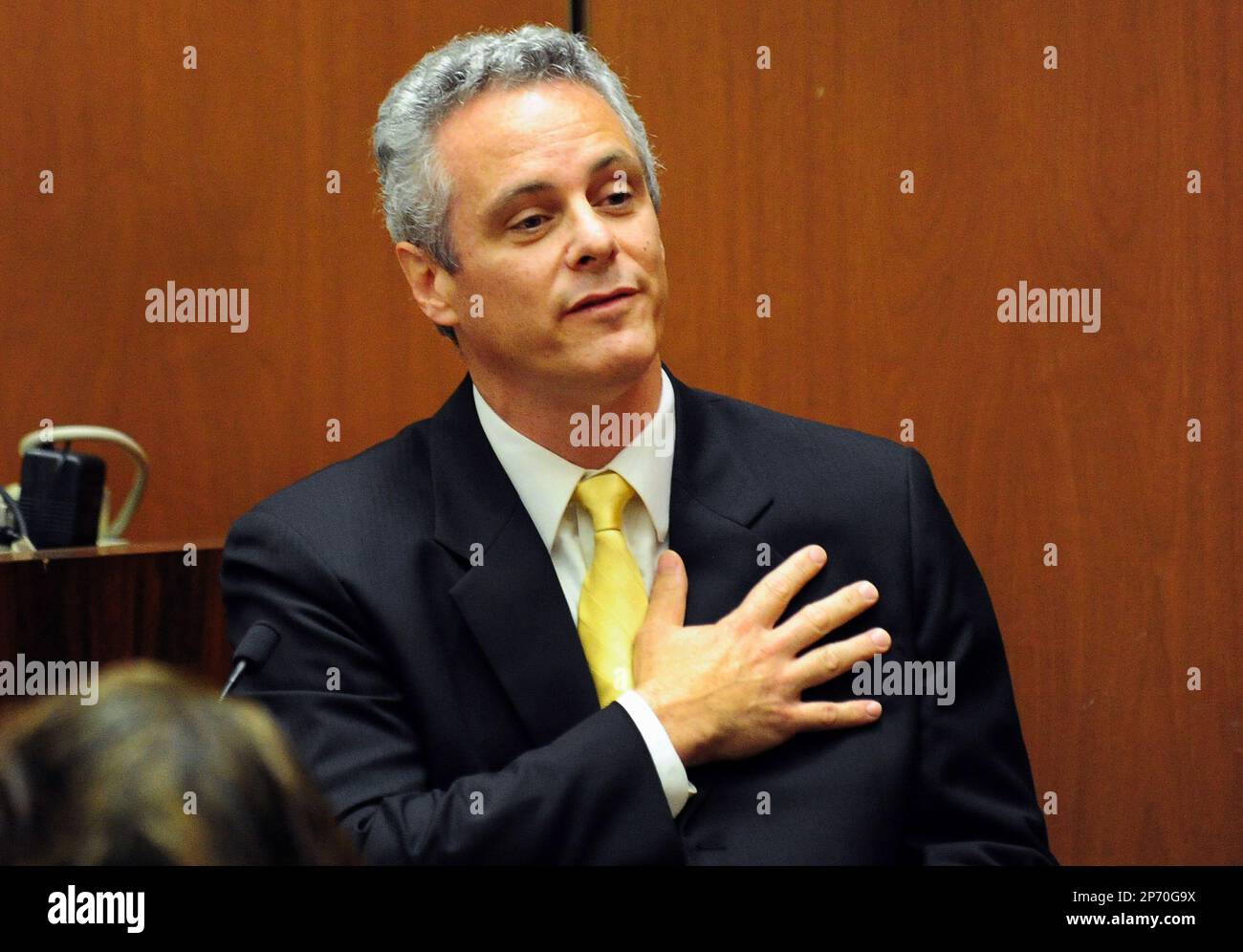 Dr. Alon Steinberg gestures while speaking from the witness stand ...