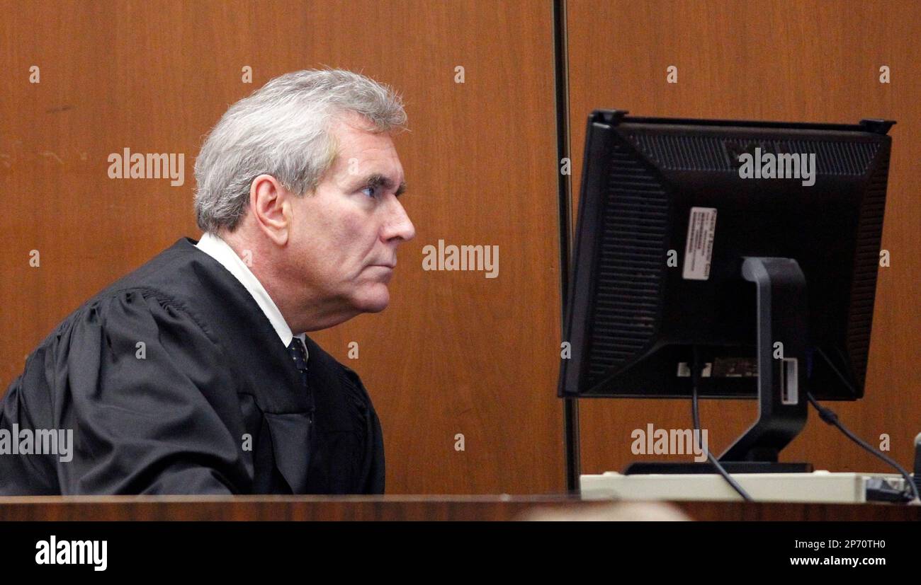 Judge Michael E. Pastor looks at a computer screen during Dr.Conrad ...