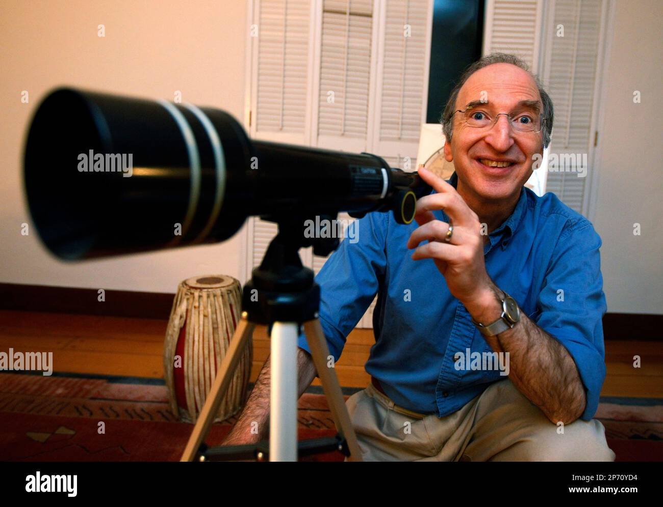 Nobel Prizes winner for physics Saul Perlmutter smiles as he poses with ...