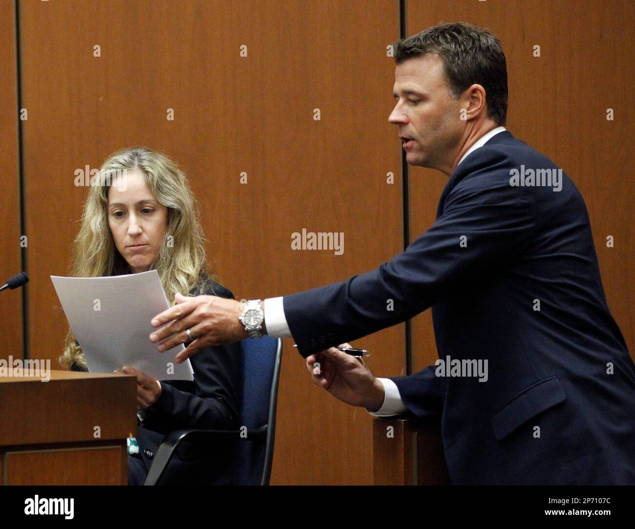 Deputy District Attorney David Walgren, right, questions Dr. Richelle ...