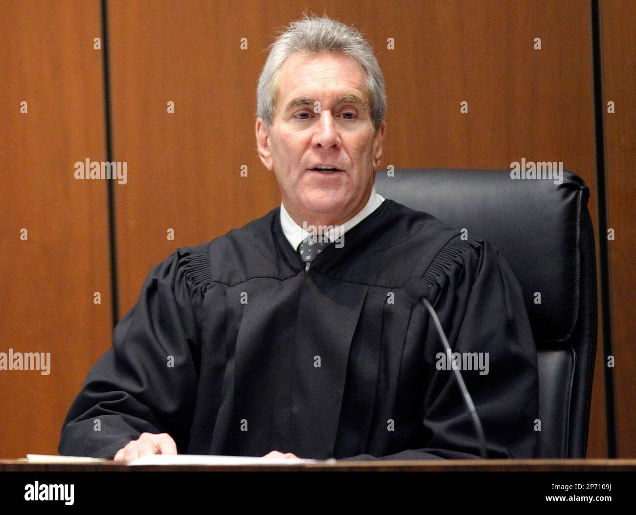 Judge Michael E. Pastor addresses the courtroom during Dr. Conrad ...