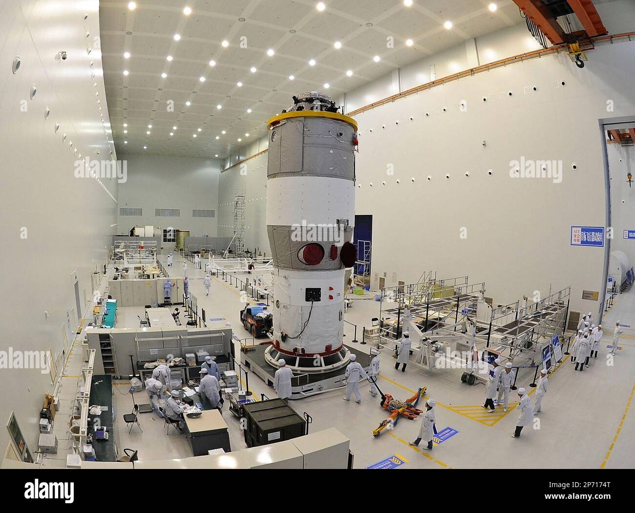 In this undated photo shows researchers testing the China's first space ...