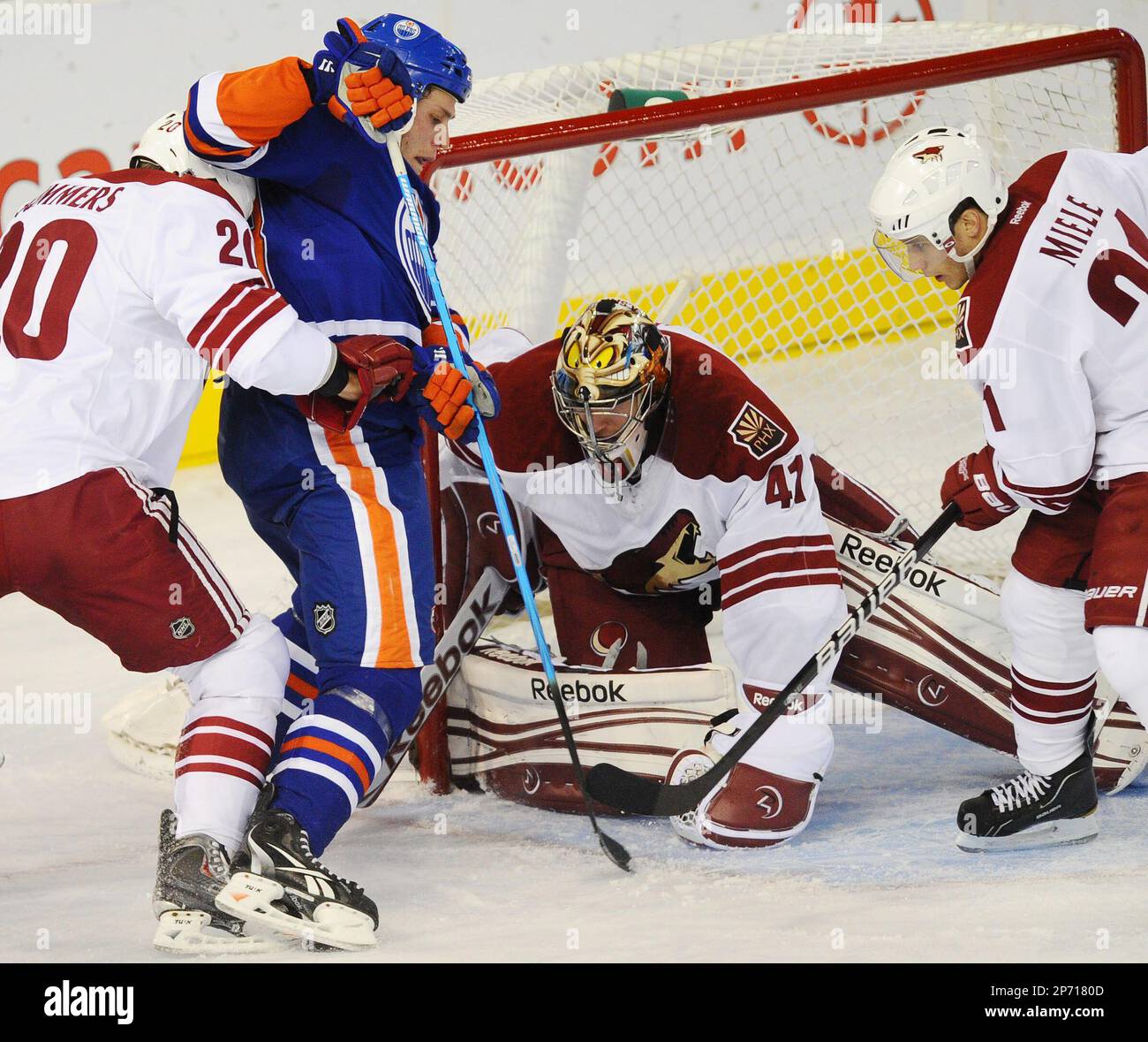 Phoenix Coyotes goalie Mike Smith stops Edmonton Oilers' Taylor Chorney ...
