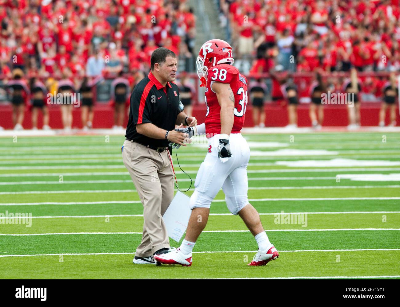 September 24 2011: Rutgers' head coach Greg Schiano talks to rb Joe ...