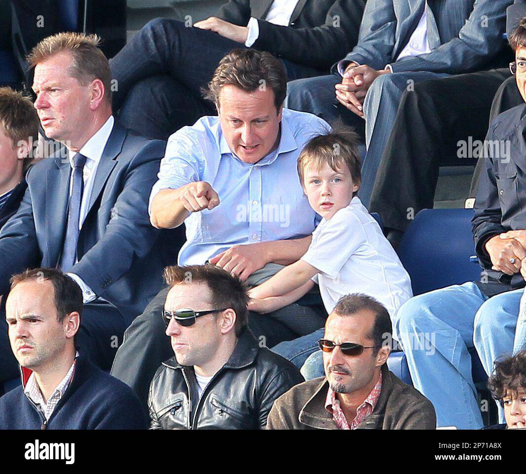 Prime Minister David Cameron watches with his son Arthur..Barclays Premier League..QPR v Aston ...