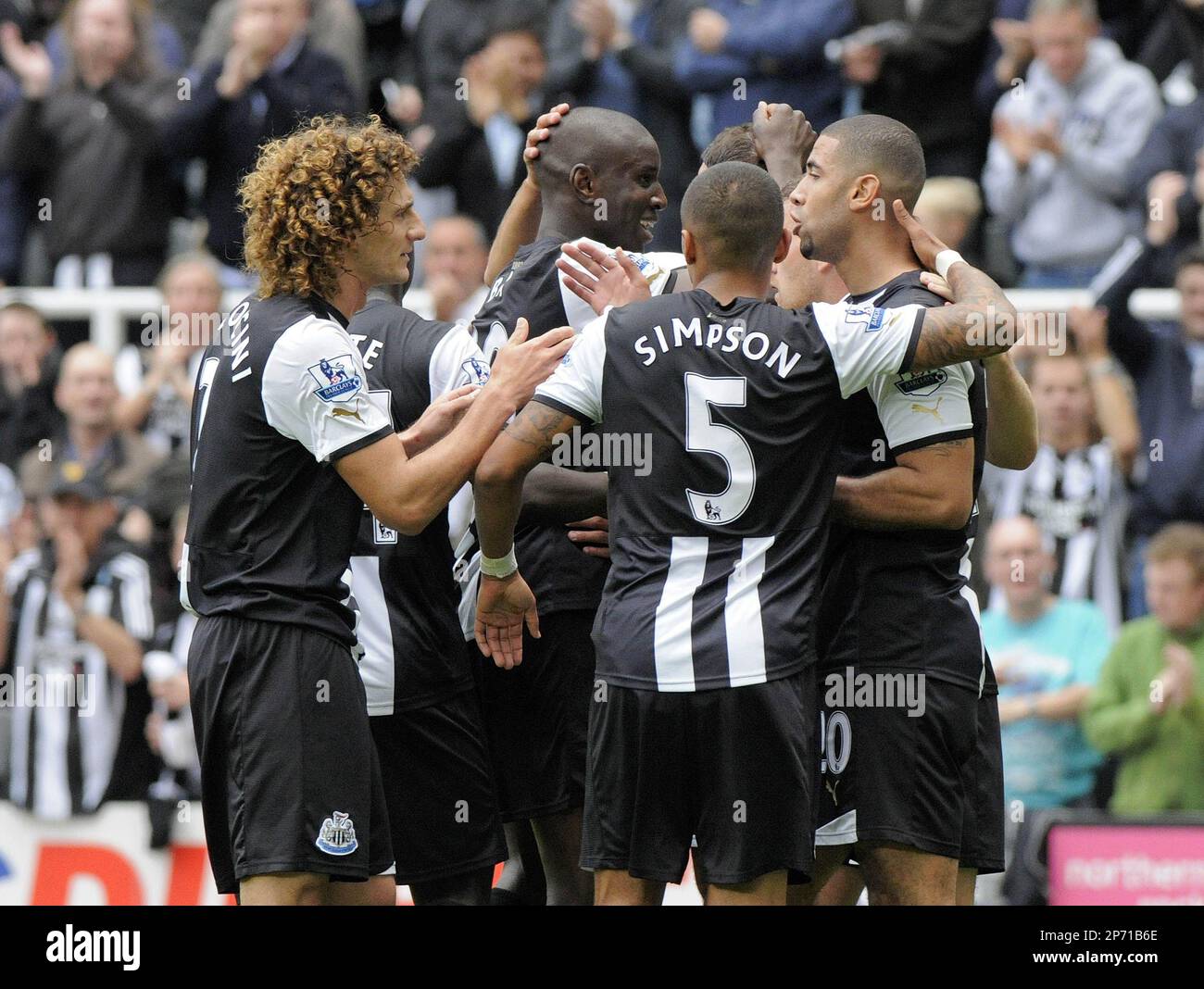 Demba Ba (2nd L) of Newcastle United celebrates scoring his side's ...