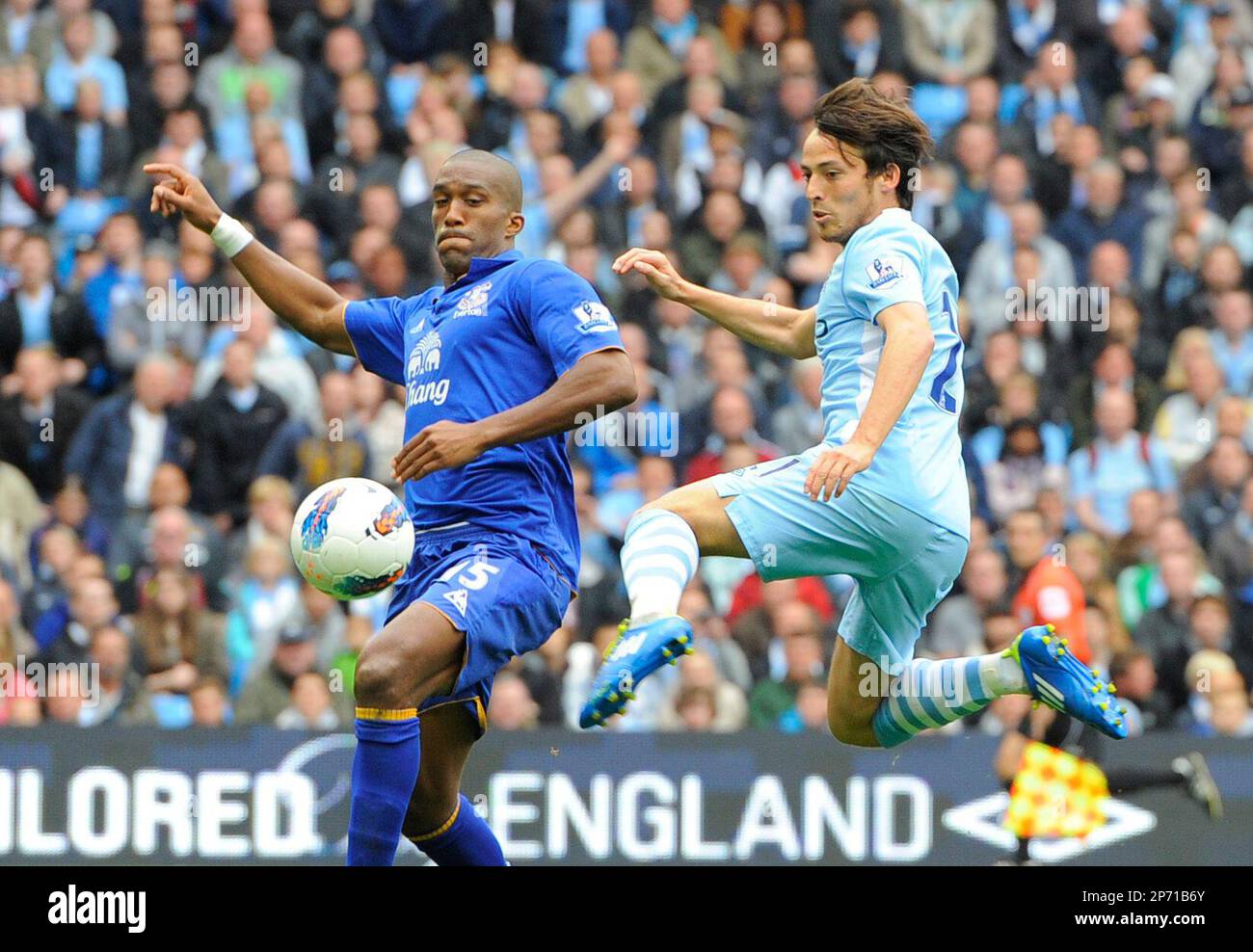 David Silva of Manchester City attempts a mid air volley as Sylvain ...