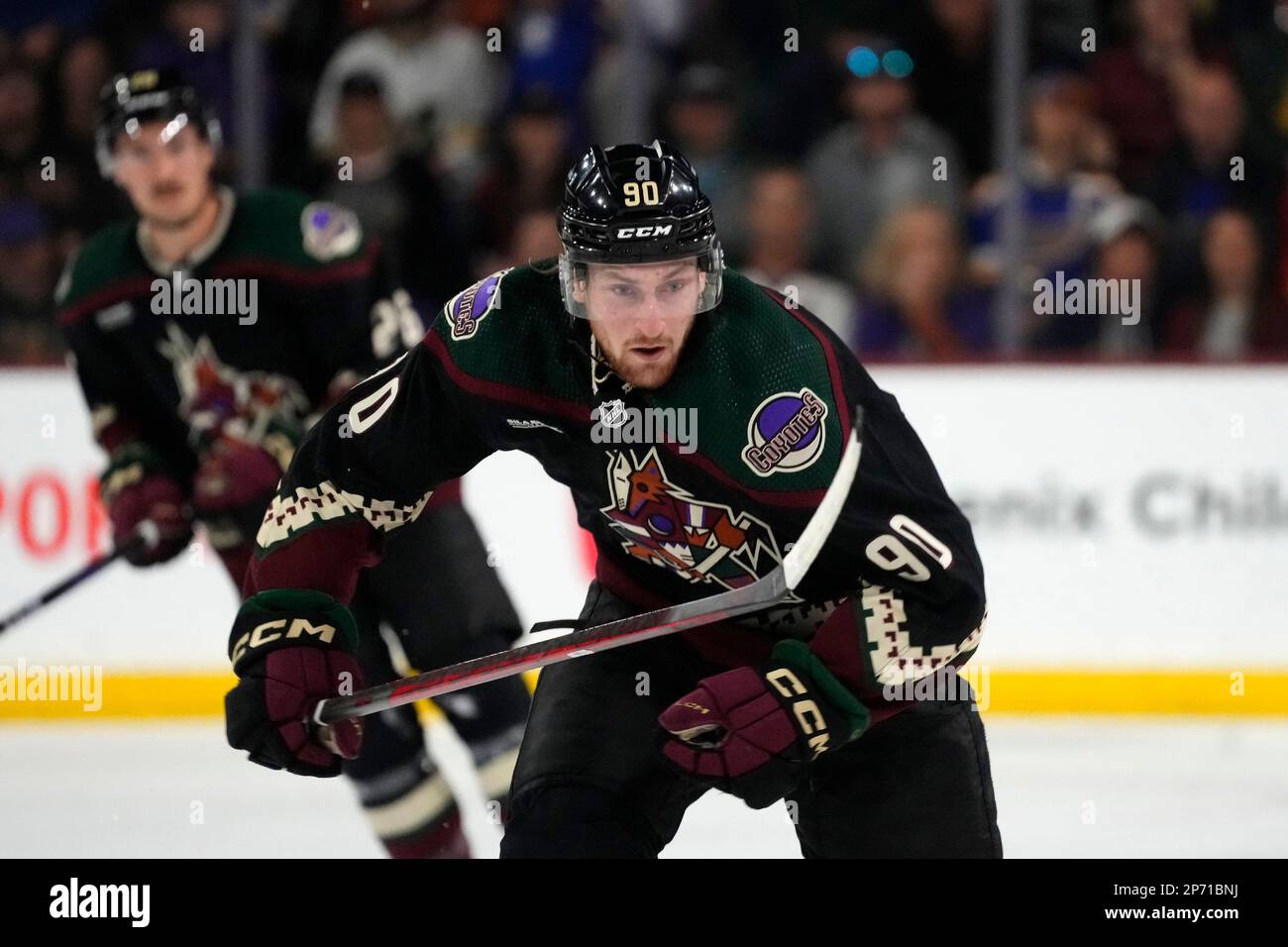 Arizona Coyotes defenseman J.J. Moser skates down ice against the St ...