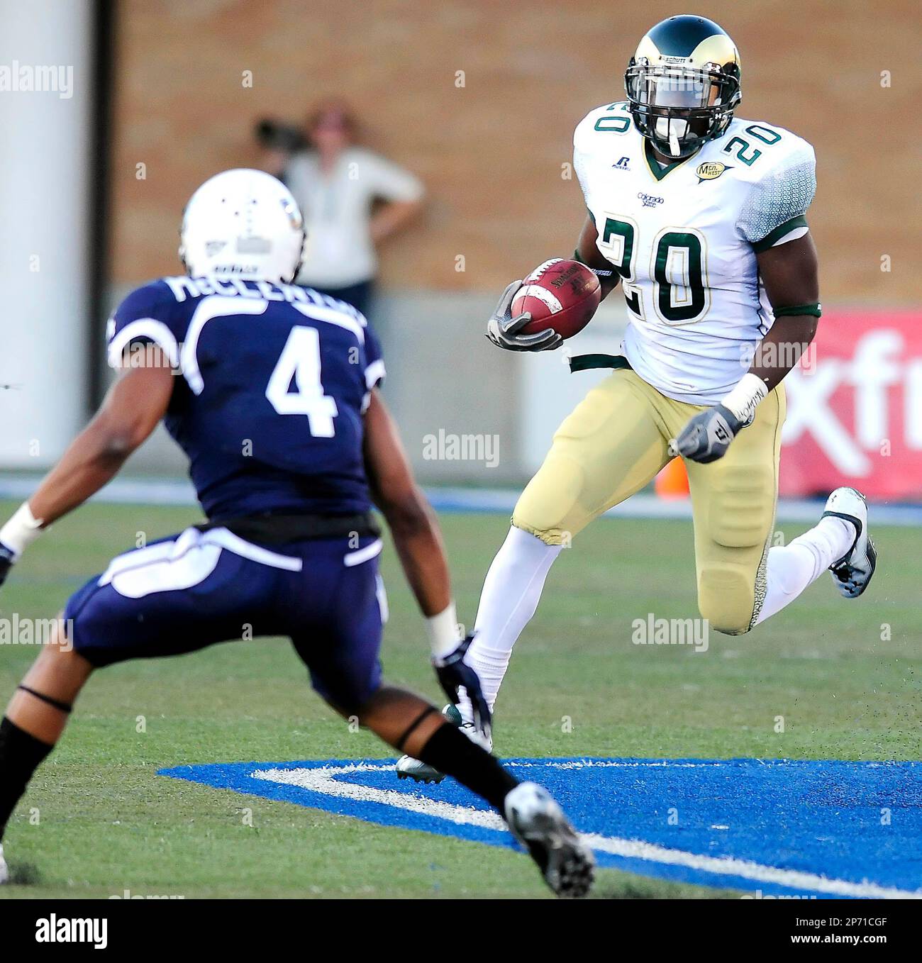 Colorado State's Raymond Carter (20) runs downfield as Utah State ...