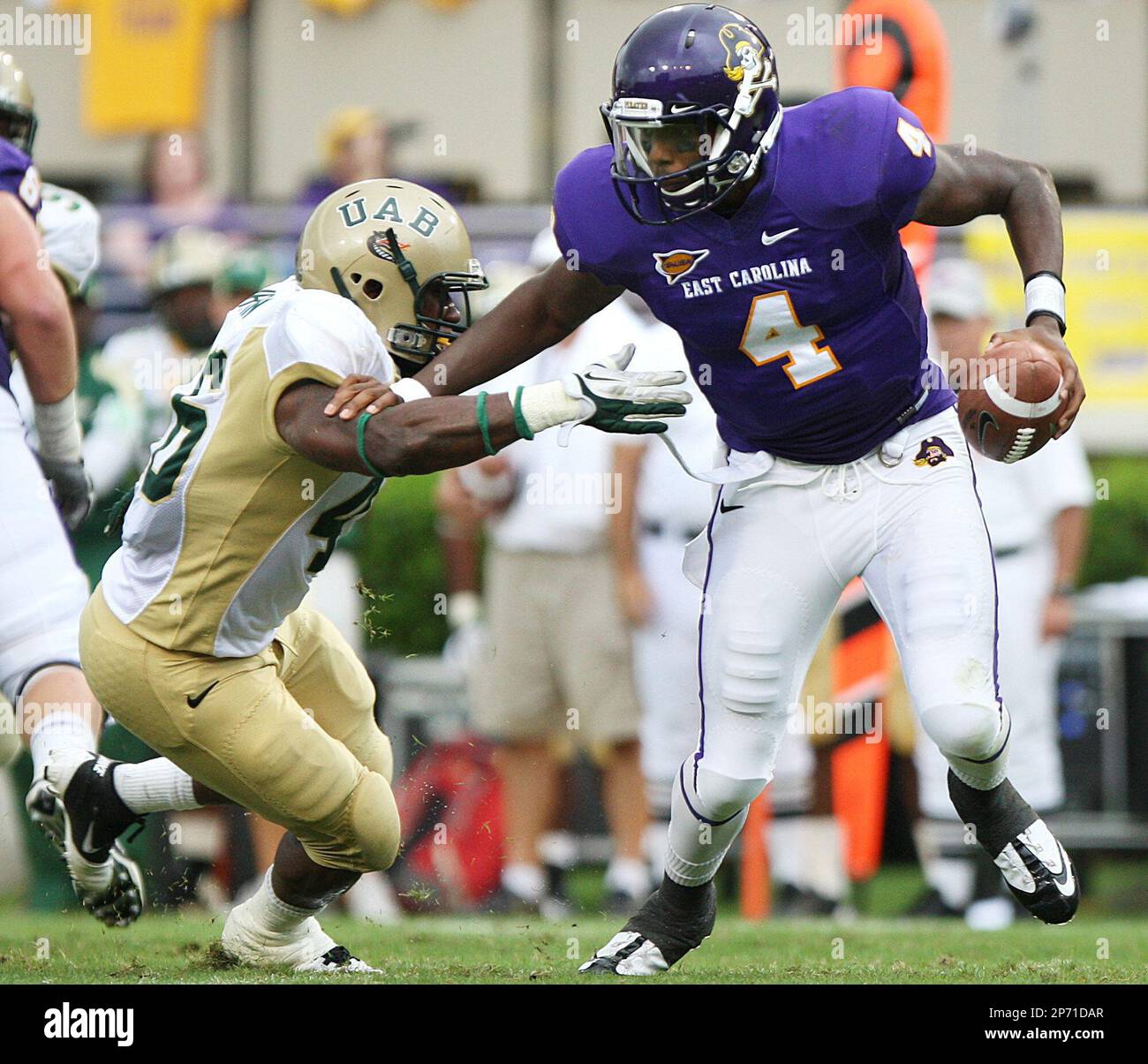 UAB's Greg Irvin attempts to bring down East Carolina quarterback ...