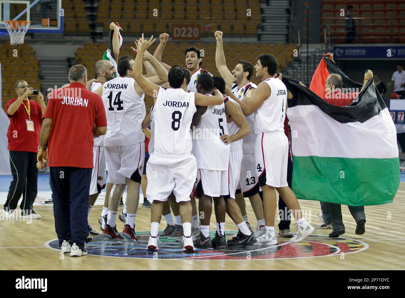 Jordan players celebrate winning the Asian Basketball Championship ...