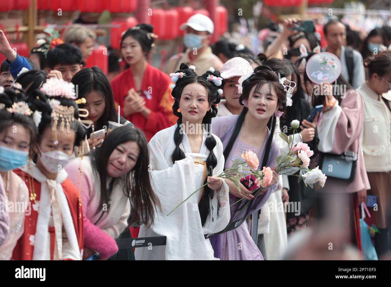 People wear hanfu at the 8th Flower Festival in Kunming City, southwest ...