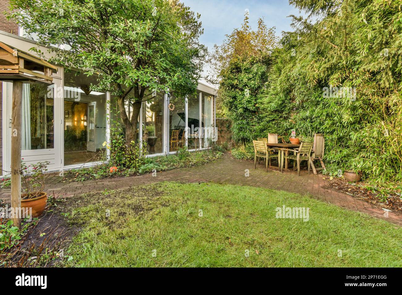 Amsterdam, Netherlands - 10 April, 2021: a backyard area with trees and ...