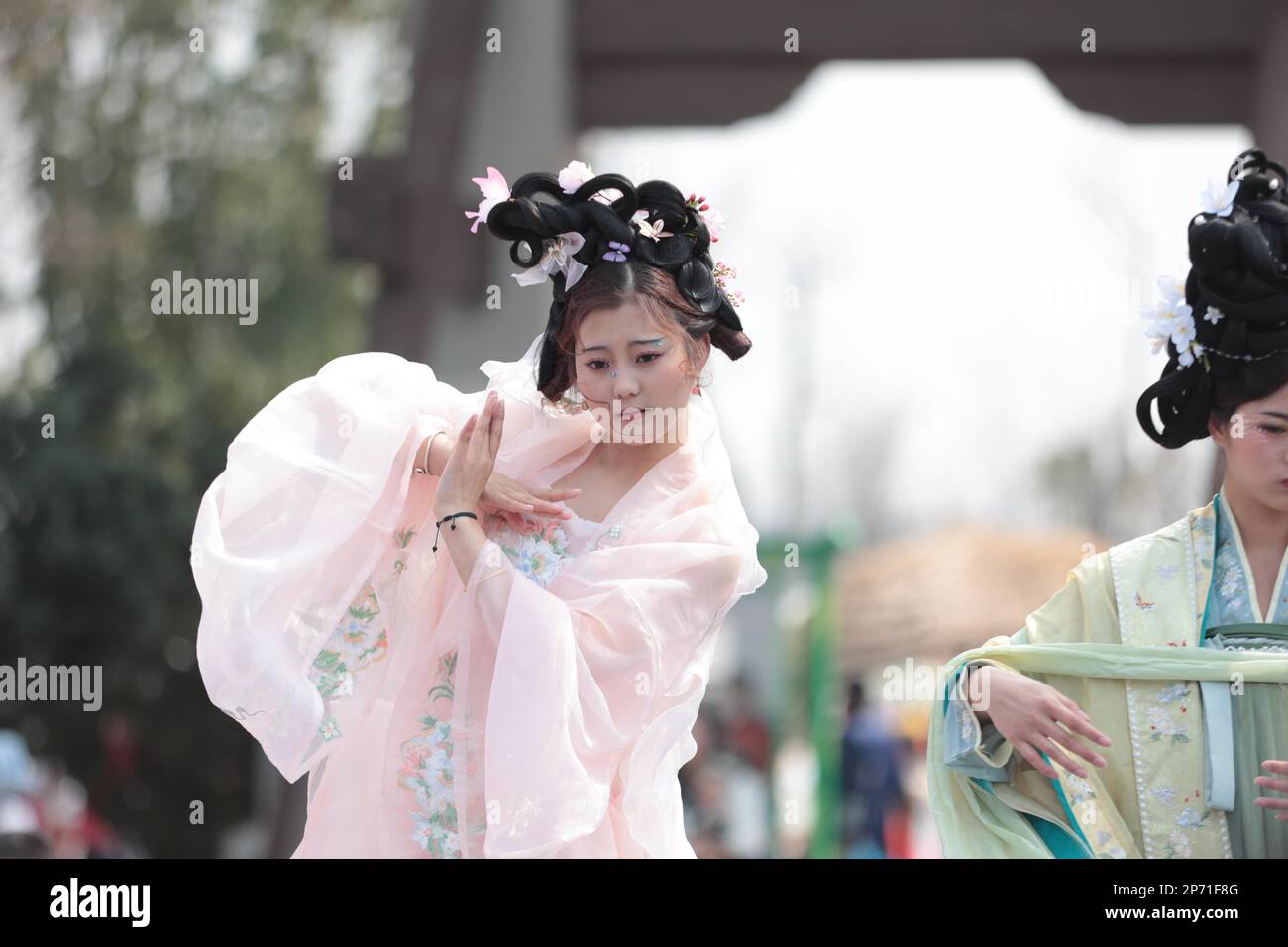 People wear hanfu at the 8th Flower Festival in Kunming City, southwest ...