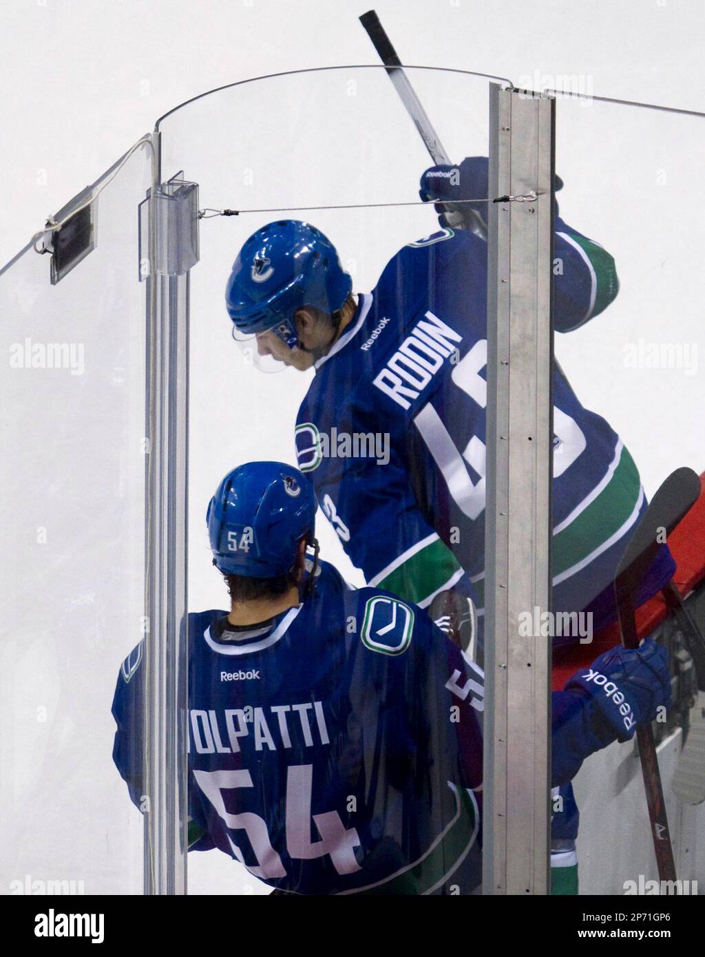 Vancouver Canucks left wing Aaron Volpatti (54) and Anton Rodin are ...