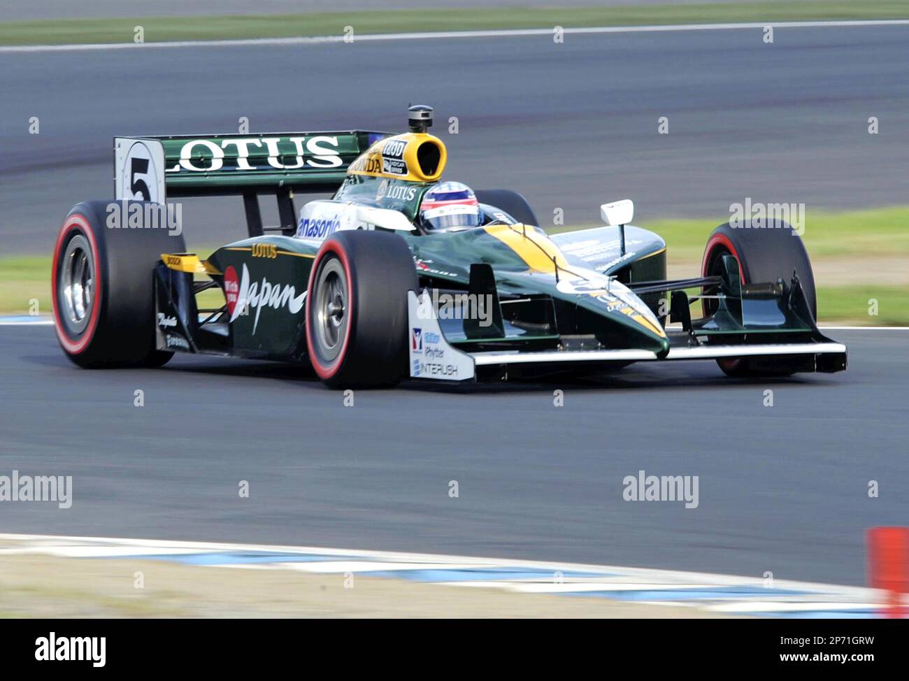 IndyCar driver Takuma Sato of Japan runs during Indy Japan auto race at ...