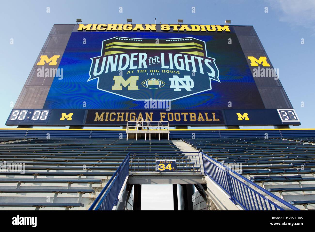 The scoreboard displays an Under the Lights logo for the first night ...