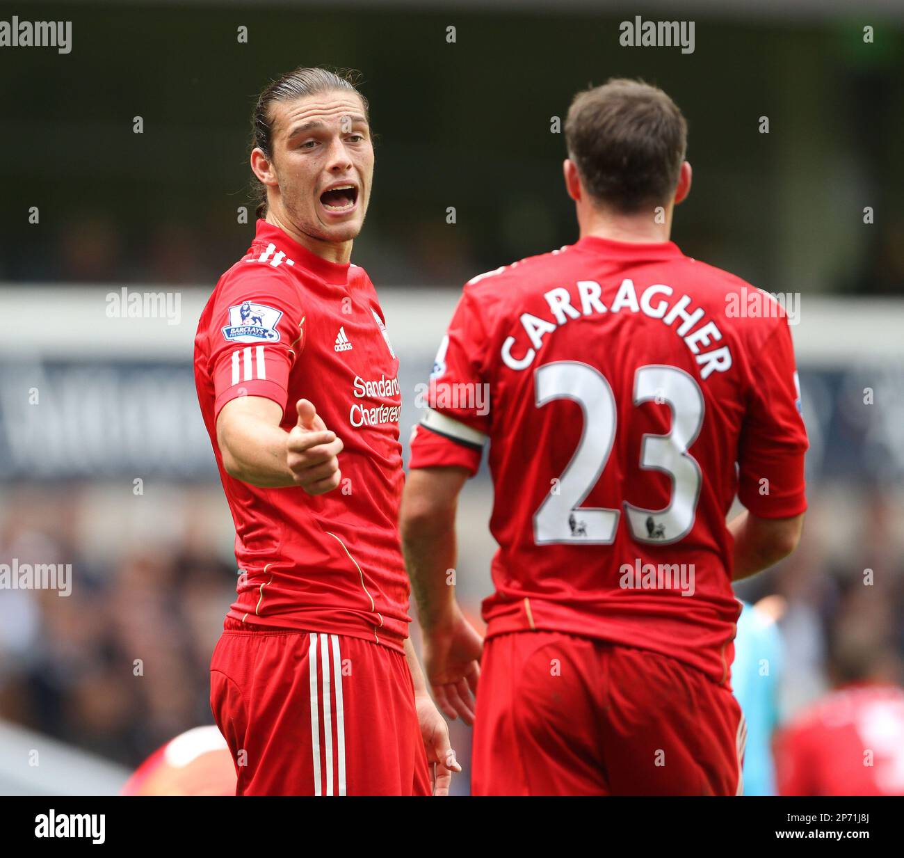 Liverpools Andy Carroll has word with Jamie Carragher..Barclays Premier ...