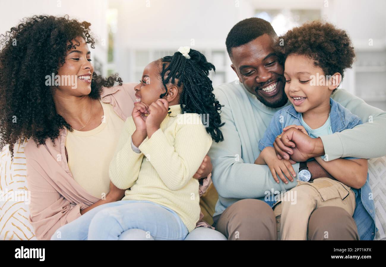 Happy, love and black family bonding on the sofa together in the living ...