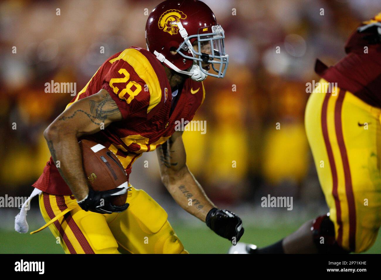 September 17, 2011: Dillon Baxter #28 of the USC Trojans carries the ...