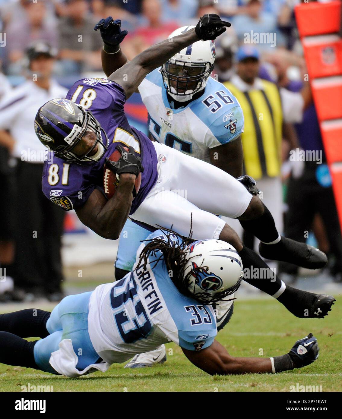 Baltimore Ravens wide receiver Anquan Boldin (81) is tripped up by ...