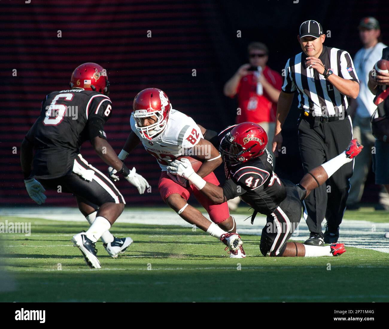 September 17, 2011: Cougar receiver Bobby Ratliff hangs onto the ball ...