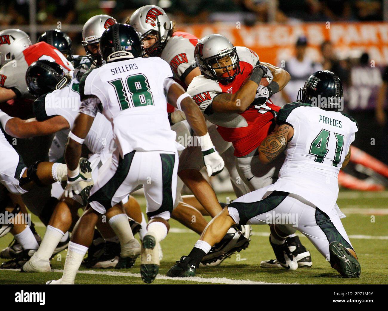 UNLV's Tim Cornett falls into the end zone for a score against Hawaii ...