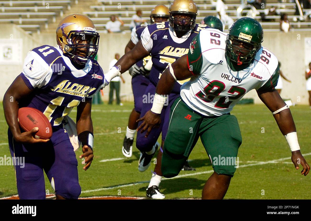 Alcorn State's Darius Smith, right, tries to get past Mississippi ...