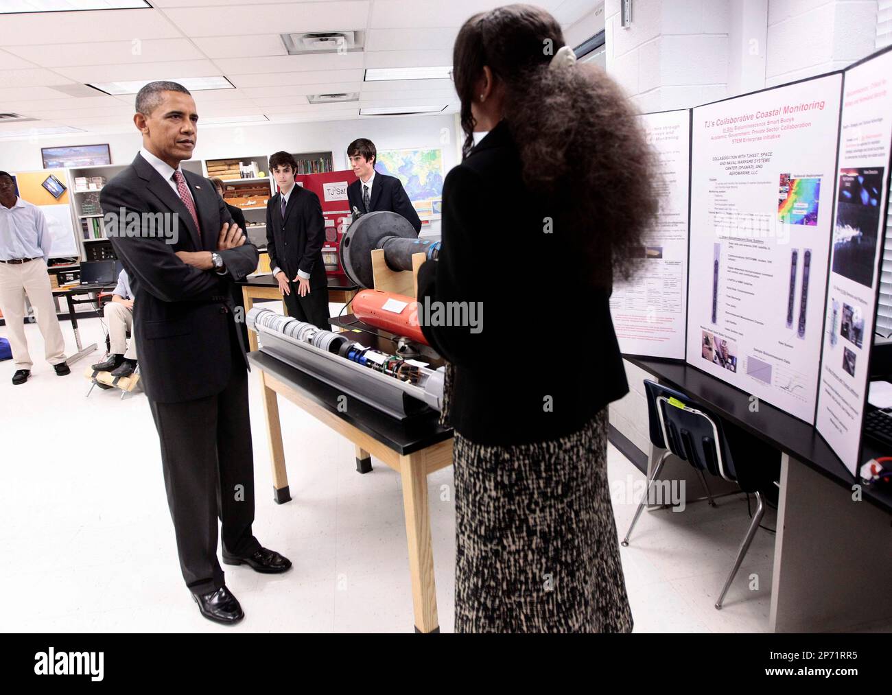 President Barack Obama listens to student Alexandria Sutton, 16, during ...