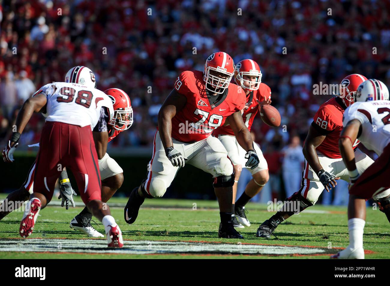 Georgia Bulldogs offensive tackle Justin Anderson (79) works to block ...