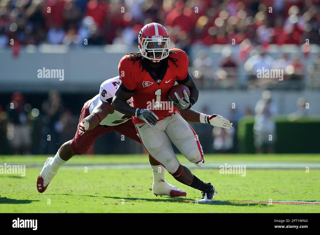 Georgia Bulldogs running back Isaiah Crowell (1) carries the ball past ...