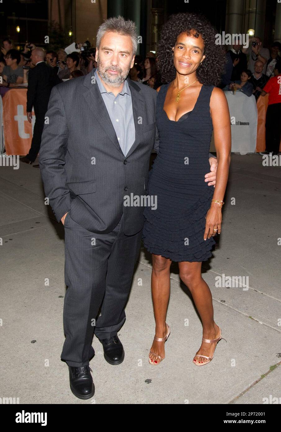 Director Luc Besson, left, and his wife Virginie Silla pose at the gala ...