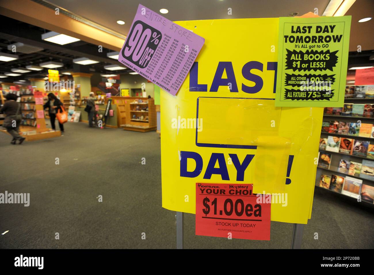 A sign noting the last day of sales is displayed at the downtown ...