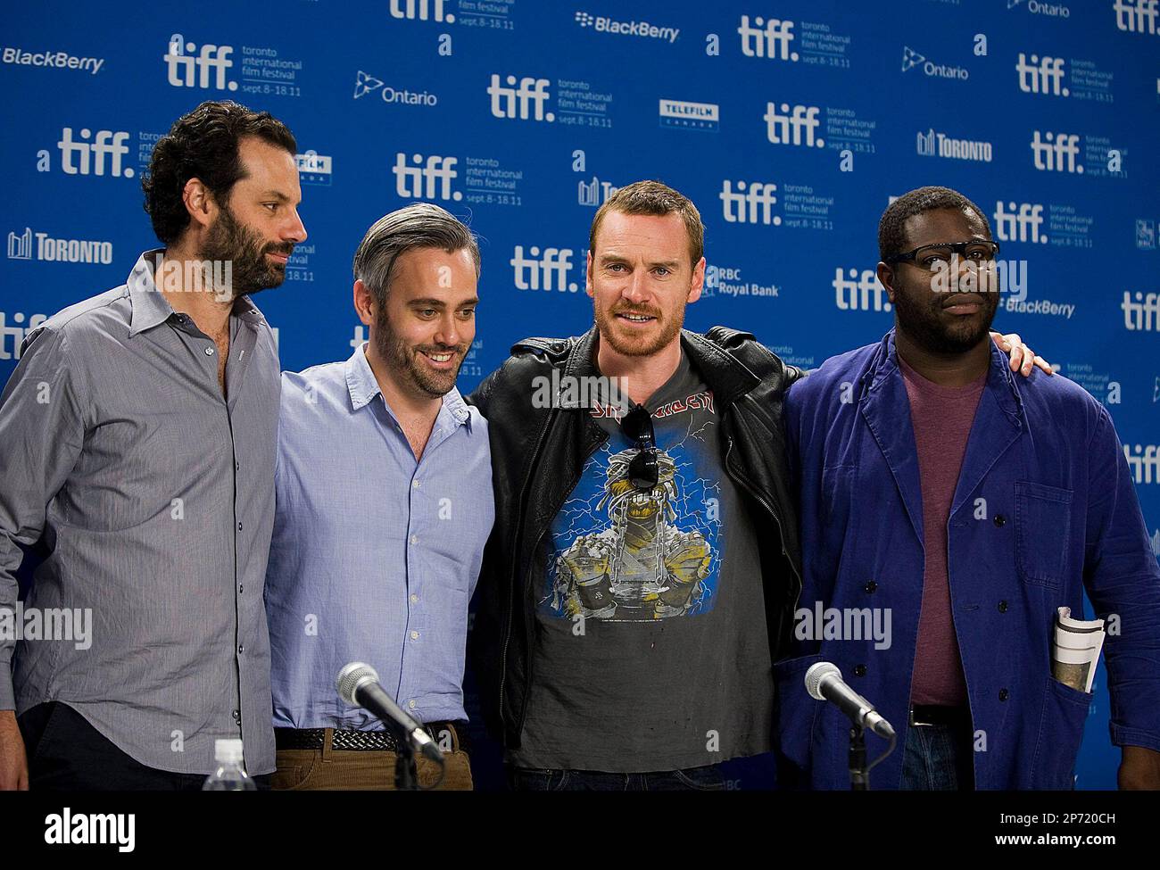 Producers Emile Sherman, from left, and Iain Canning, actor Michael ...