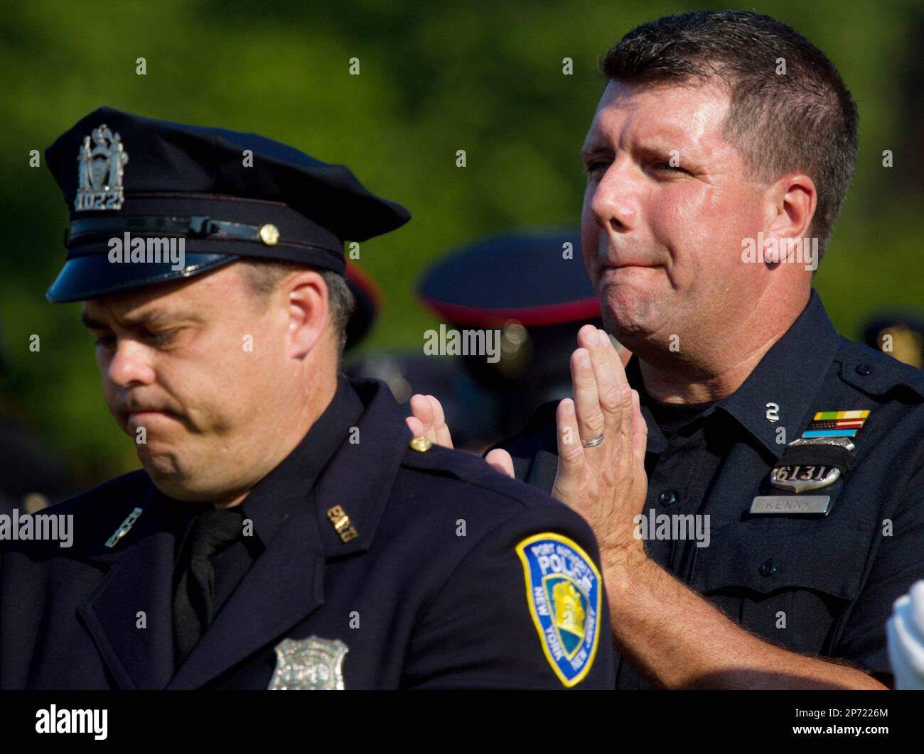 New York City Port Authority police Officer Raymond Murray, left, and ...