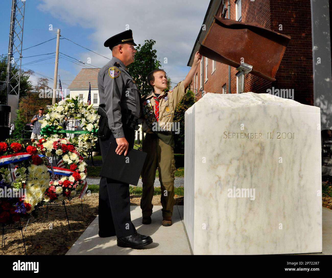 Benjamin Doucette of Boy Scouts Troop 353, with his father, Paul ...