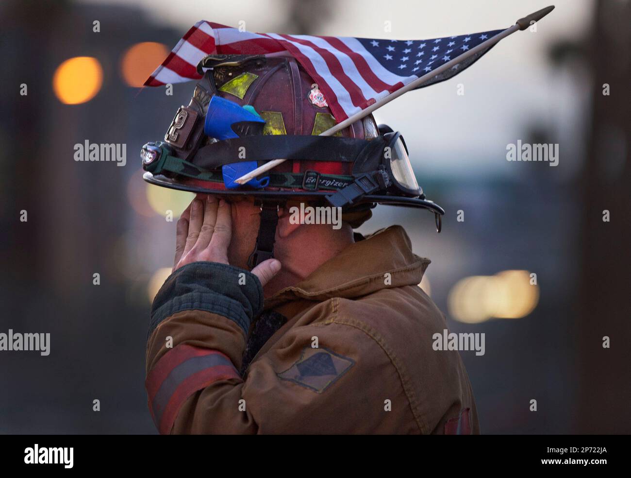 Las Vegas firefighter Capt. Eric Littmann walks in a parade ...