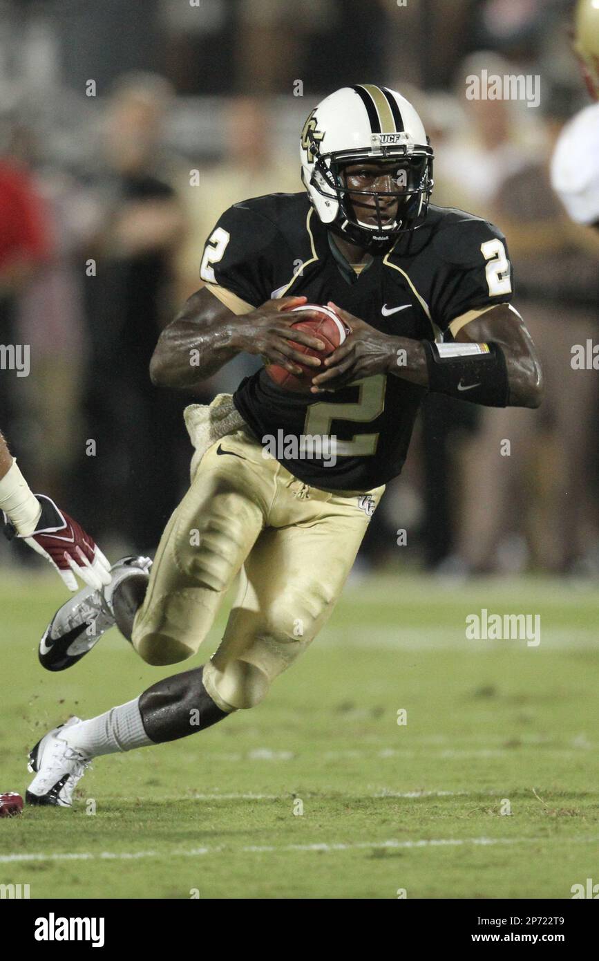 Central Florida quarterback Jeff Godfrey (2) runs during an NCAA ...