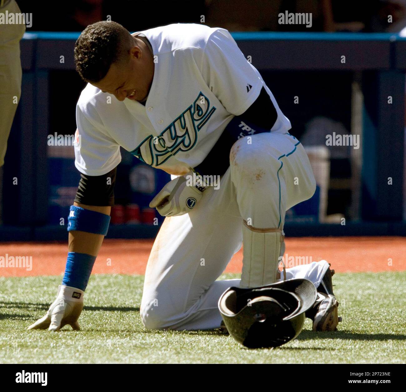 Toronto Blue Jays' Yunel Escobar reacts after getting hit by a pitch ...
