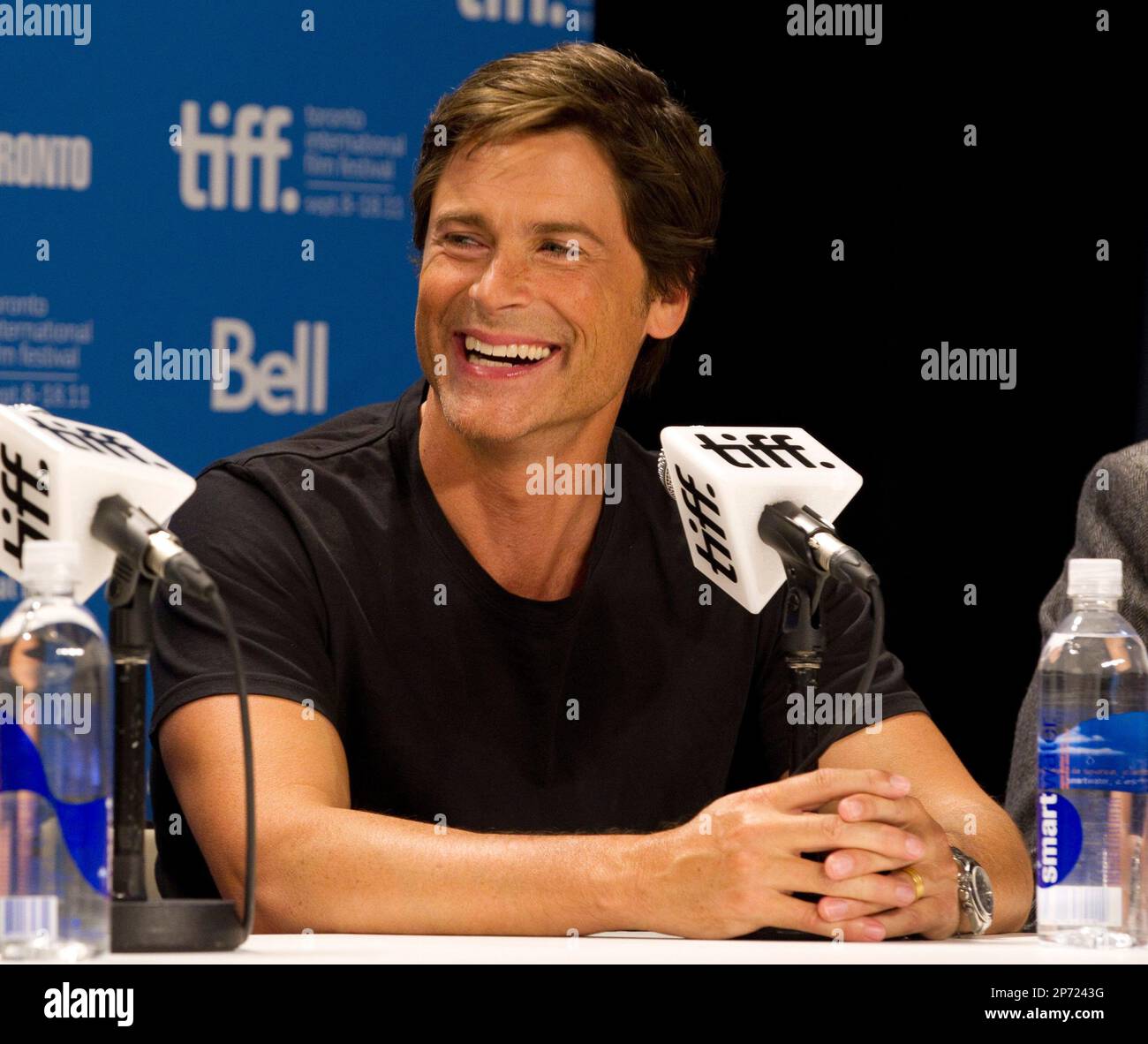 Rob Lowe laughs during the news conference for the film "Breakaway" at ...