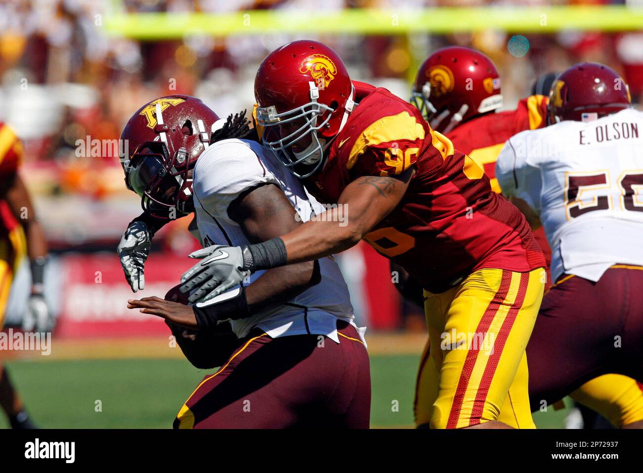 September 03, 2011: Wes Horton #96 of the USC Trojans attempts to sack ...