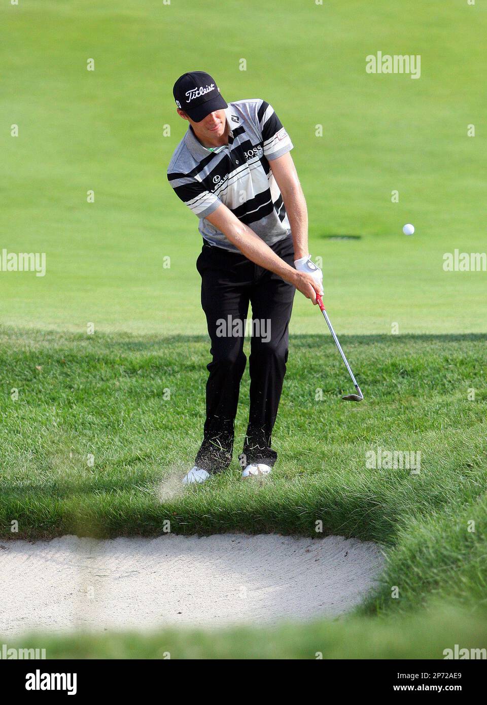 September 4, 2011: Nick Watney chipping a shot at the tenth hole during ...