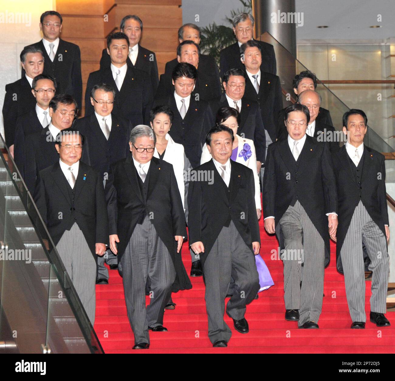 New Japanese Prime Minister Yoshihiko Noda (front center) and members ...