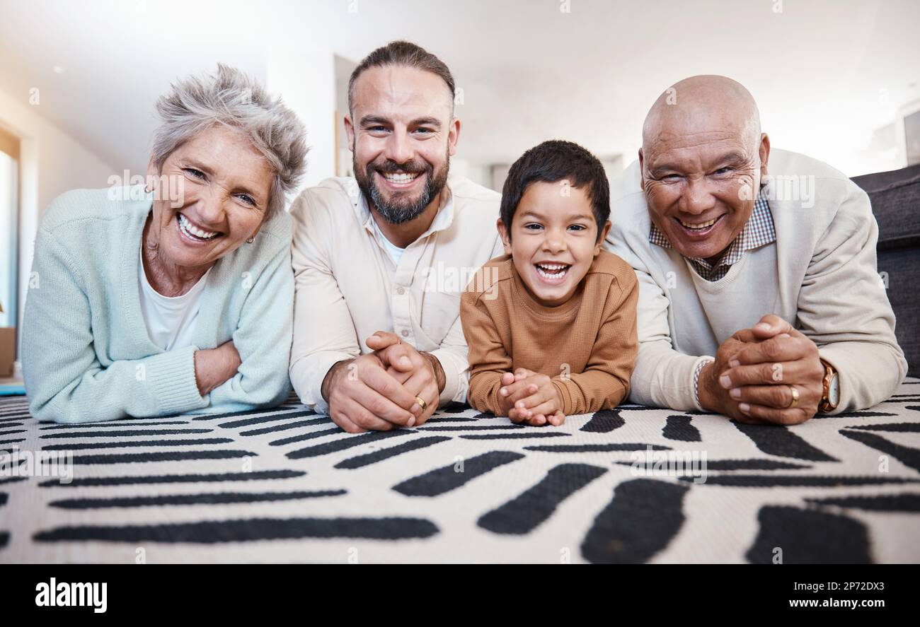 Happy family, portrait and living room floor in a home with a smile ...
