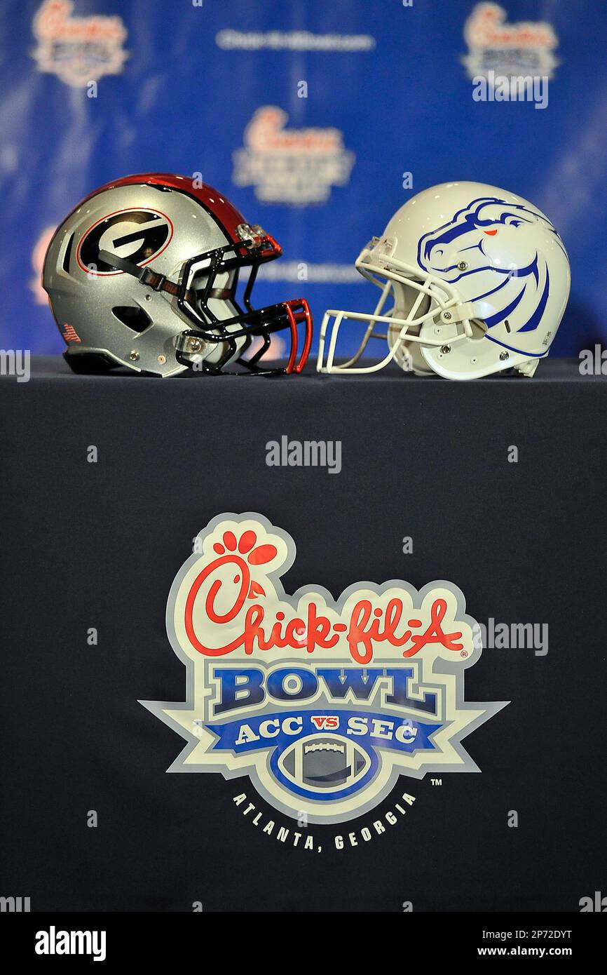 A detail view of the Georgia Bulldogs and Boise State Broncos helmets ...