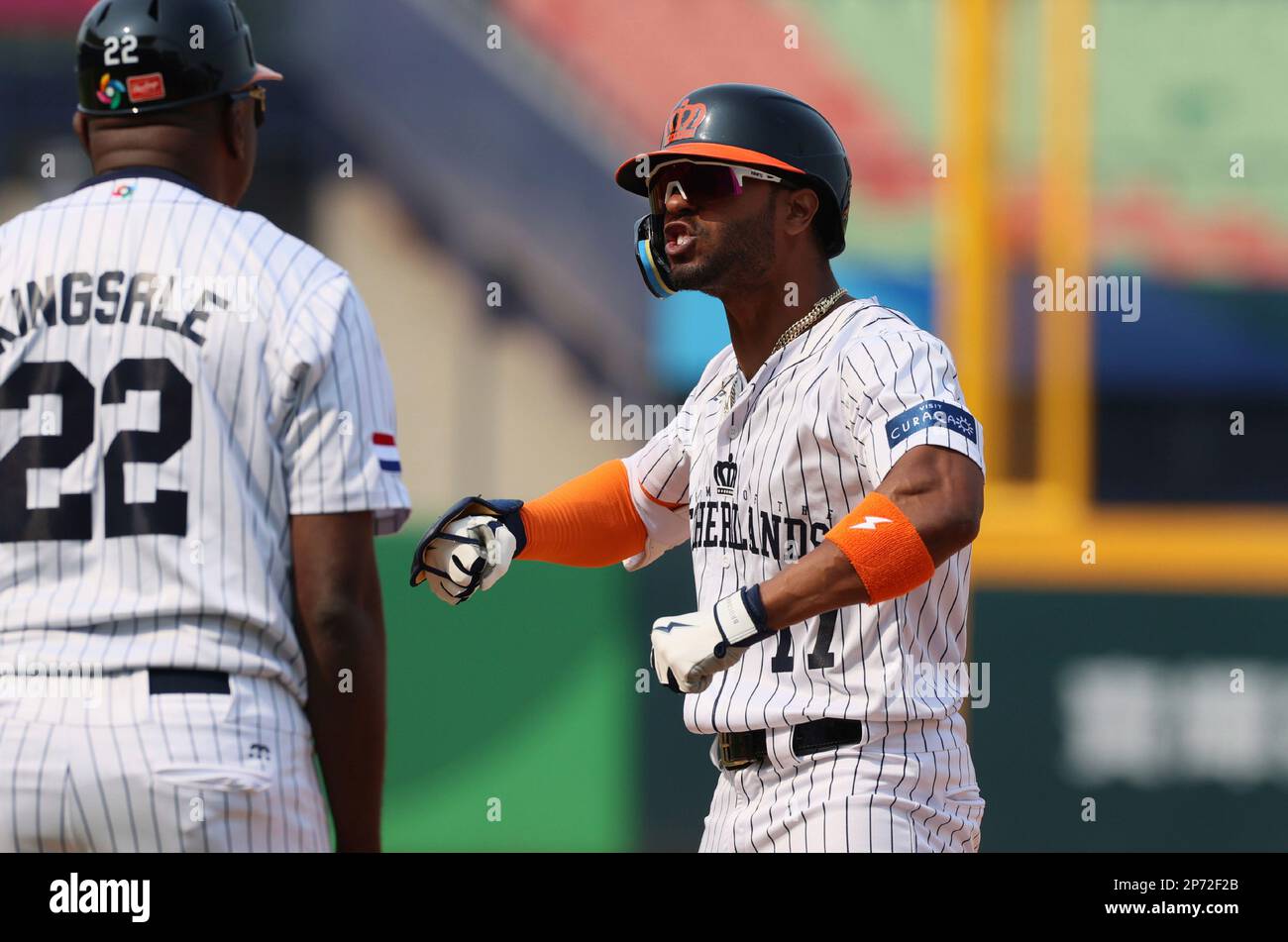 Netherlands' Josh Palacios reacts after hitting RBI in the 6th inning ...
