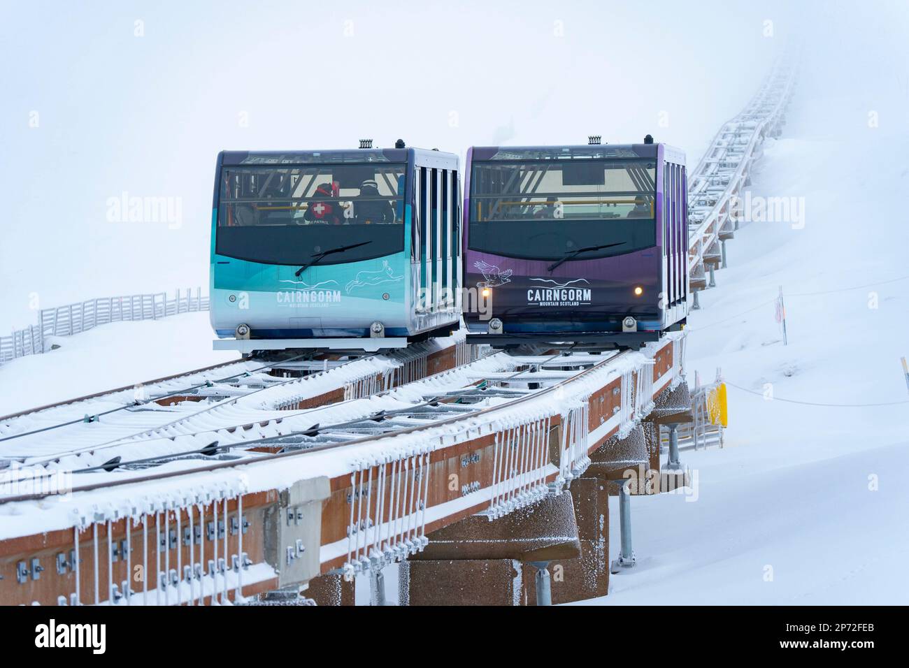 The newly re-opened Cairngorm Mountain Railway funicular carries skiers ...