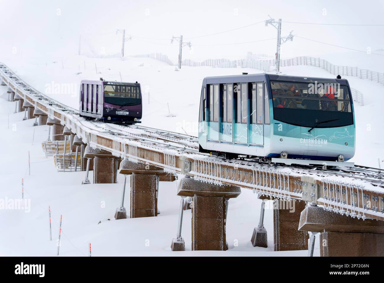 The newly re-opened Cairngorm Mountain Railway funicular carries skiers ...