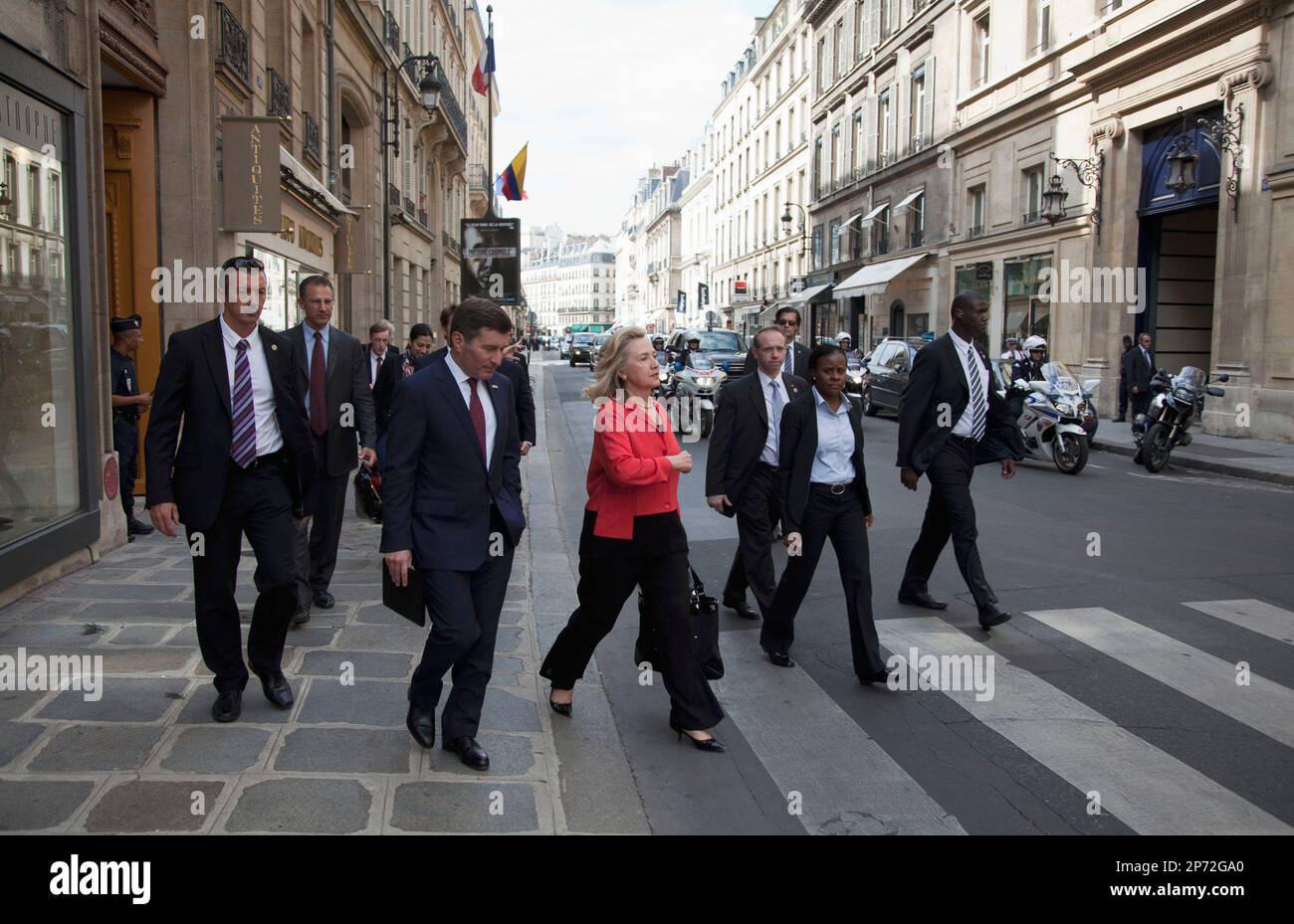 Secretary of State Hillary Rodham Clinton walks away from the Elysee ...
